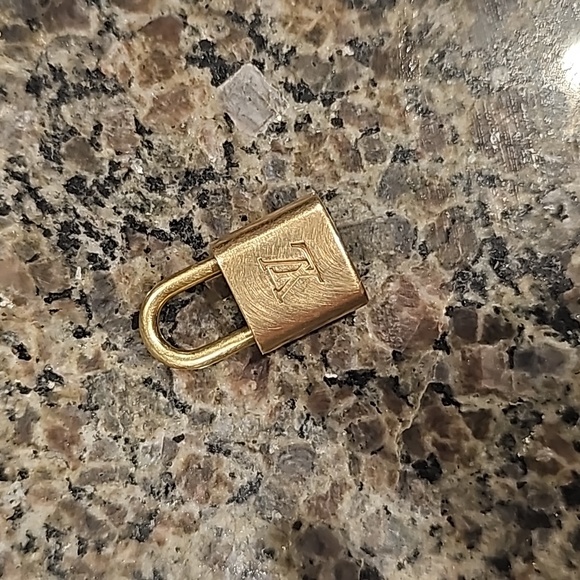 Louis Vuitton | Bags | Louis Vuitton Lock | Poshmark
